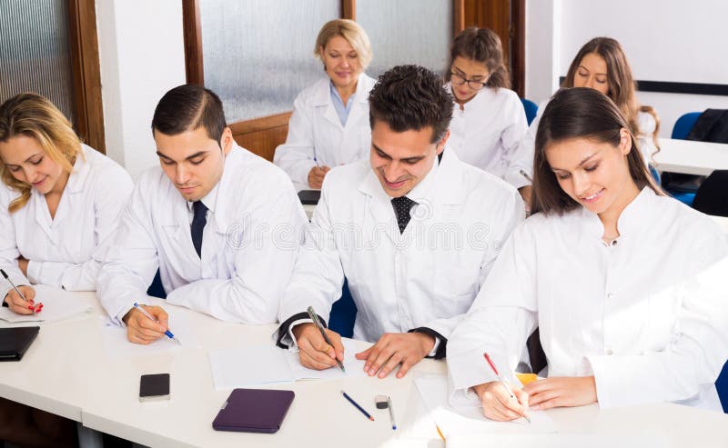 Professor Having Discussion with College Students Stock Photo - Image ...