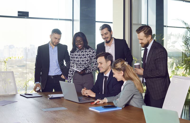 Multinational Office Team Communicating during a Work Meeting in the ...