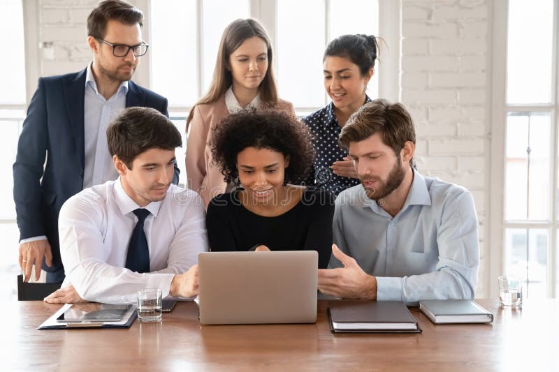 Corporate Staff Employees Working Together Using Computers at Co Stock ...