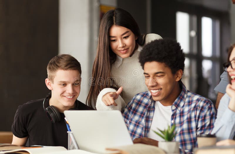 Multinational Students Talking Over Project, Library Interior Stock ...