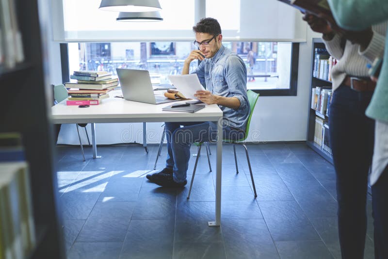 Multinational Team of Business School Students Using Modern Device ...