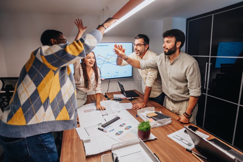 Multinational Team Collaborates in a Board Room, Discussing ...