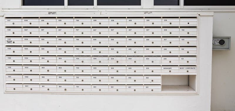 Multiple Apartment Building Mailboxes Stock Photo - Image of front ...