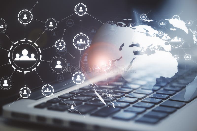 Multiple Application Hologram Icons with a Laptop on the Desk in the ...