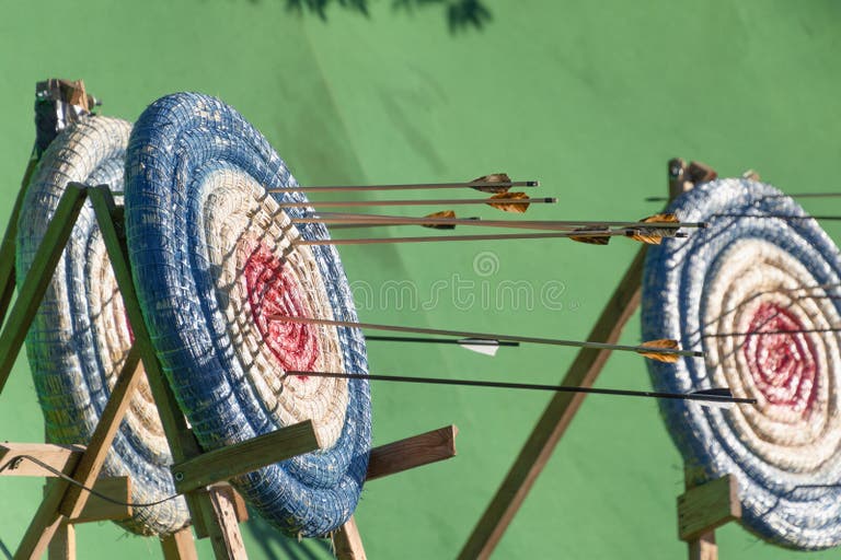 Multiple Arrows Striking Archery Targets Outdoors on a Sunny Day Stock ...
