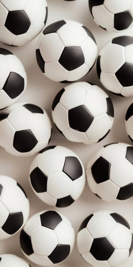 Multiple Black and White Soccer Balls Arranged Tightly in a Patterned ...