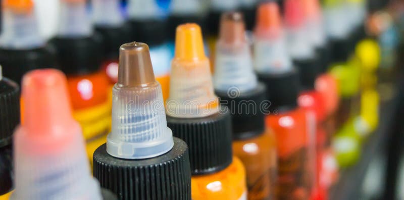 Multiple Bottles with Colorful Inks for Tattoo. Side View Stock Image ...