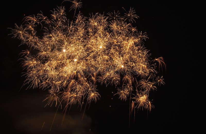 Multiple Bright Yellow Fireworks at Night Stock Image - Image of bright ...