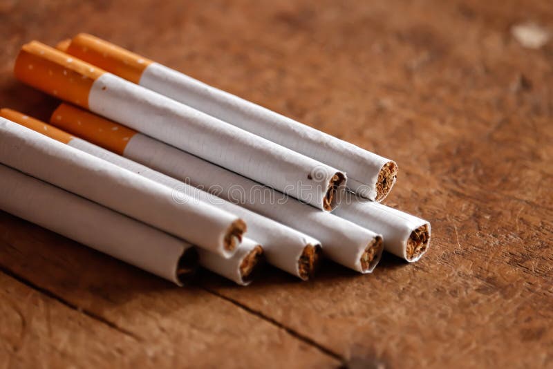Multiple Cigarette on Wooden Table with Selective Focus,a Pack of ...