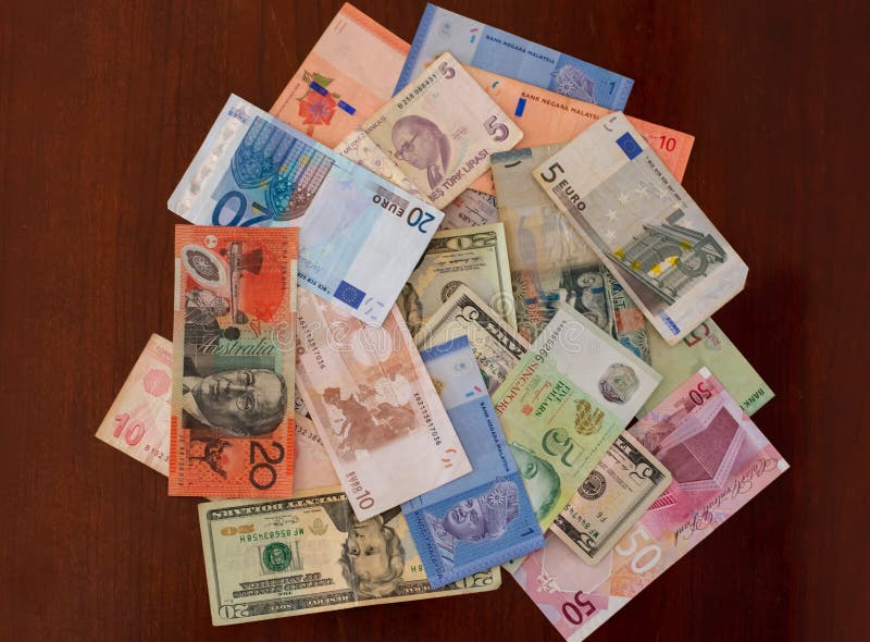 Multiple Currencies Scattered on Wooden Table Stock Image - Image of ...