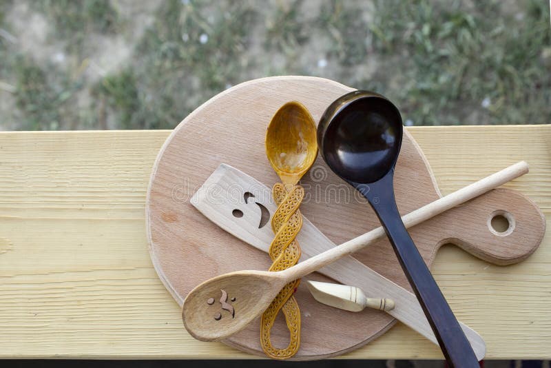 Multiple Different Wood Spoons on a Wooden Board Stock Image - Image of ...