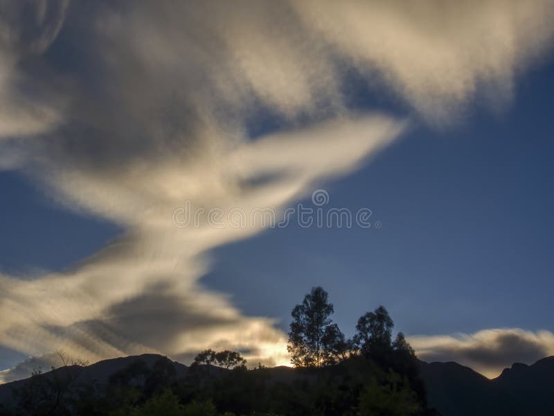 Multiple Exposure of Some Clouds at Sunrise Over the Central Mountains ...