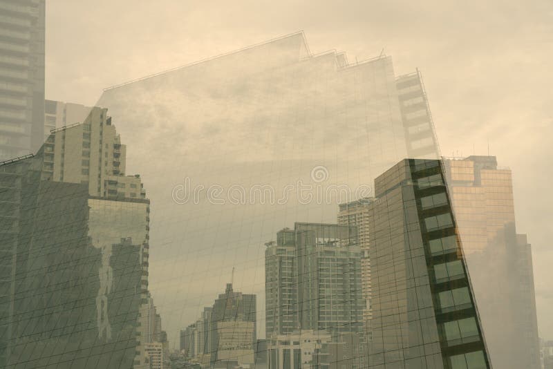 Portrait of Multiple Exposure of Tall Corporate Buildings Stock Image ...