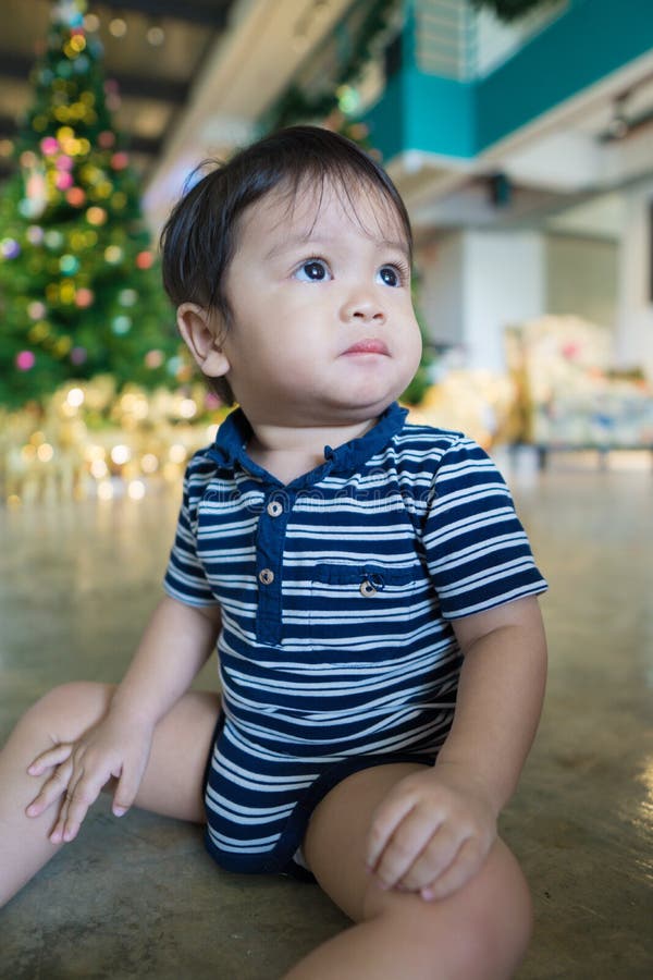 Multiple Expressions of an Adorable Asian Baby Left Alone, with ...