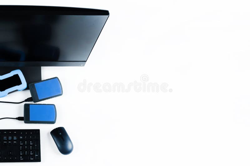 Multiple External Hard Drives Connected To a Monoblock on a White ...