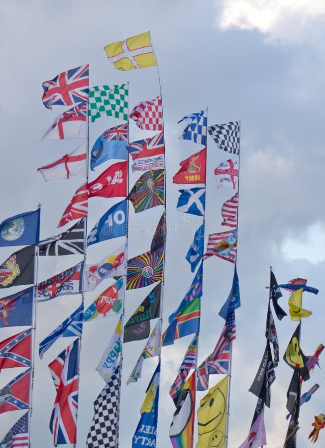 Multiple Flags on Poles at a Carnival Stock Image - Image of fluttering ...
