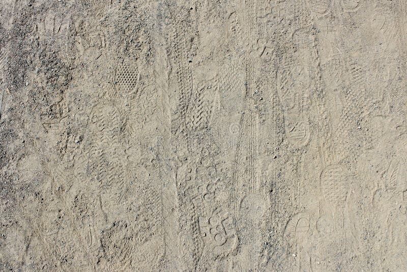 Multiple Footprints on Sand Dust Stock Image - Image of dirty, road ...