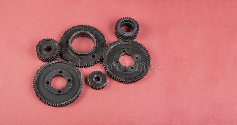 Multiple Gears Joined Together on Isolated Red Banner Stock Image ...