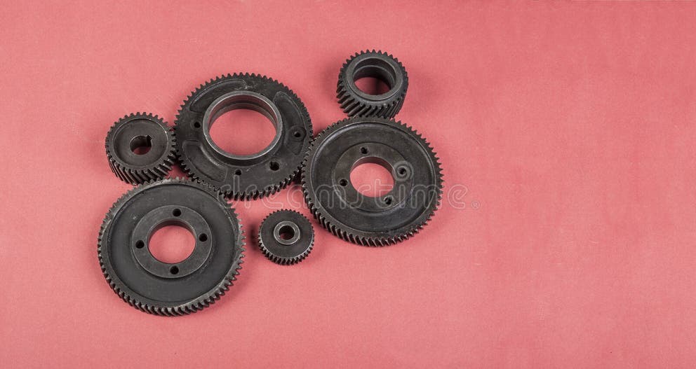 Multiple Gears Joined Together on Isolated Red Banner Stock Image ...