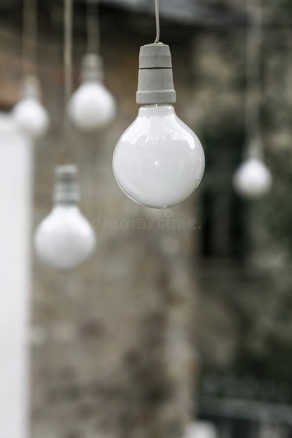 Multiple Hanging Light Bulbs Stock Photo - Image of economical ...