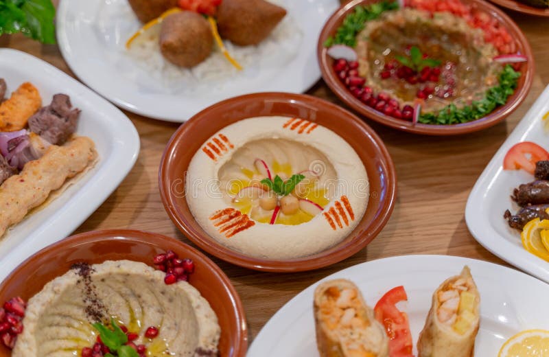 Multiple Lebanese Appetizers and Salads Togeather on the Table. Focused ...