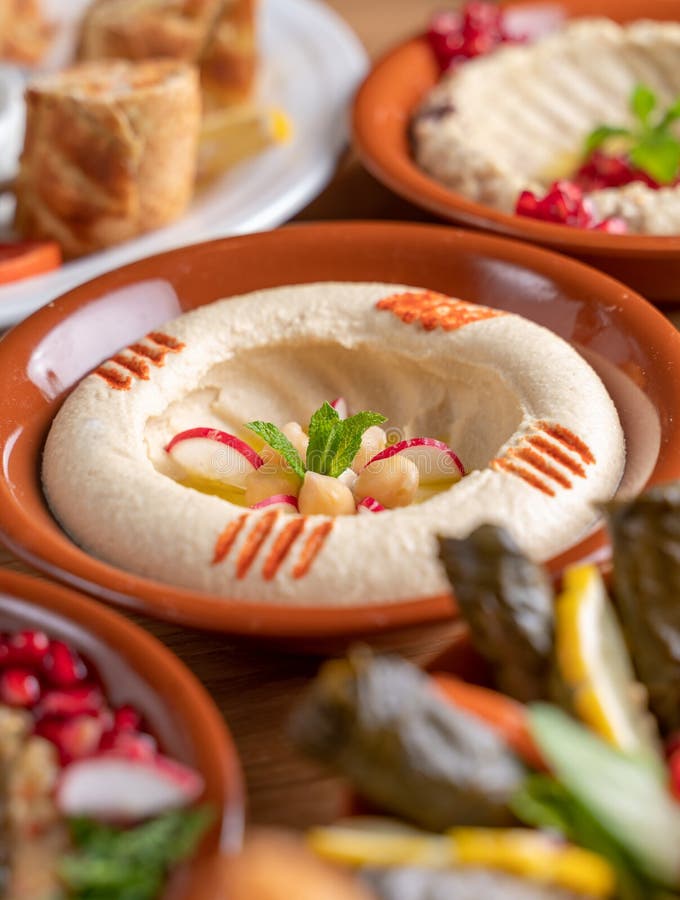 Multiple Lebanese Appetizers and Salads Togeather on the Table. Focused ...