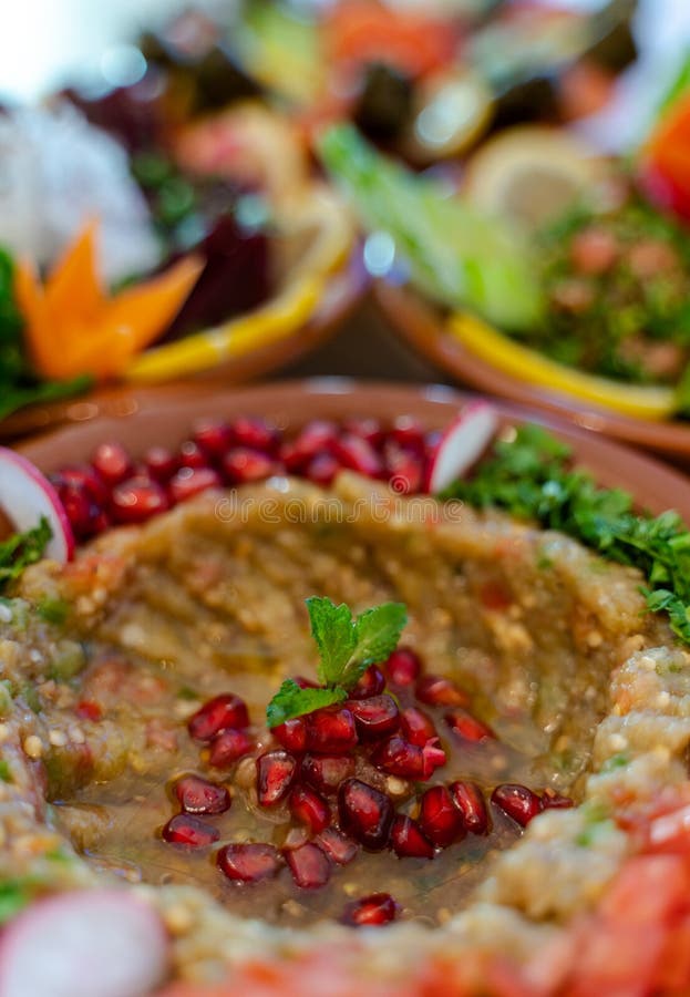 Multiple Lebanese Appetizers and Salads Together on the Table. Focused ...