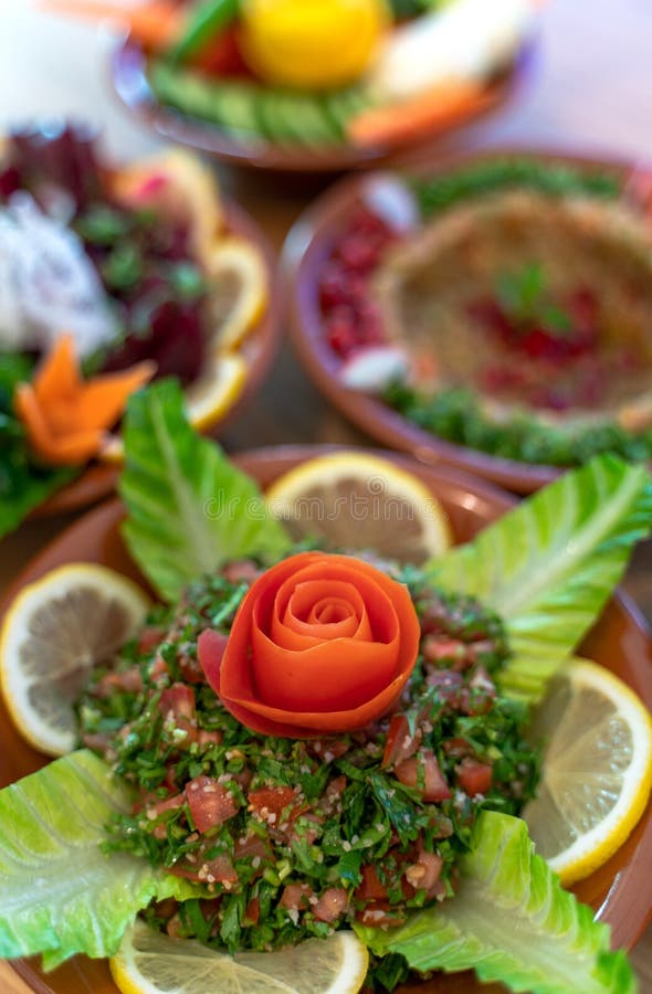 Multiple Lebanese Appetizers and Salads Together on the Table. Focused ...