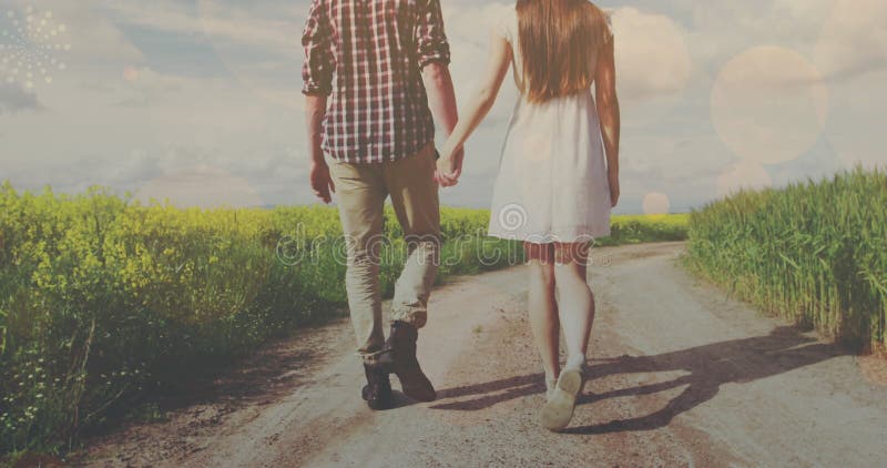 Multiple Light Spots Floating Against Rear View of Caucasian Couple ...