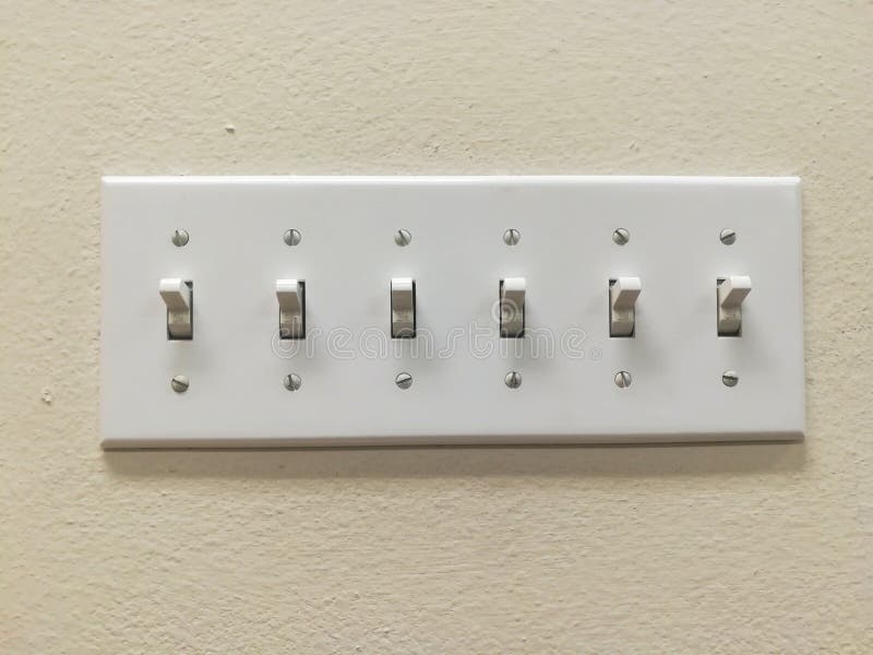 Multiple Light Switches Grouped Together Stock Photo - Image of ...