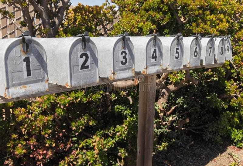 Multiple Mailboxes Lined Up Stock Photo - Image of mailboxes, entrance ...