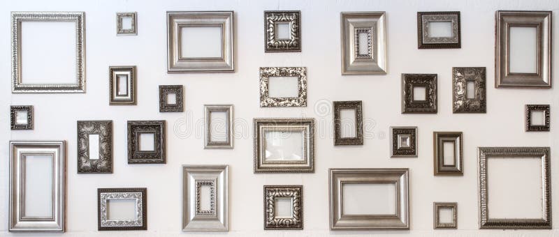 Multiple Many Blank Small Picture Frames on White Wall Stock Photo ...