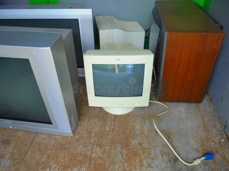 Multiple Old Computer Monitors and TVs Inside of Electric Waste ...