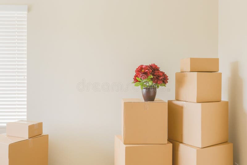 Multiple Packed Moving Boxes in Empty Room Stock Photo - Image of ...