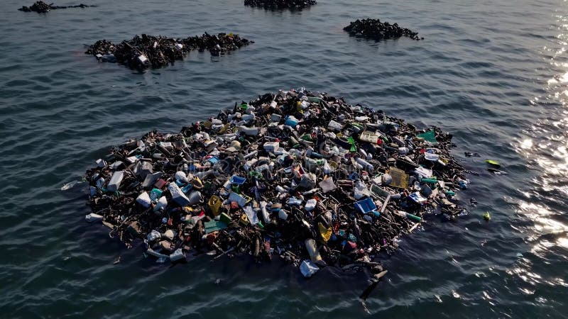 Multiple Plastic Waste Islands Floating on Rippled Ocean Surface Stock ...