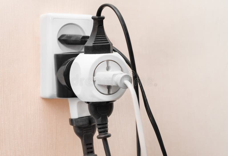 Danger of Electrical Overload Stock Photo - Image of danger, charger ...