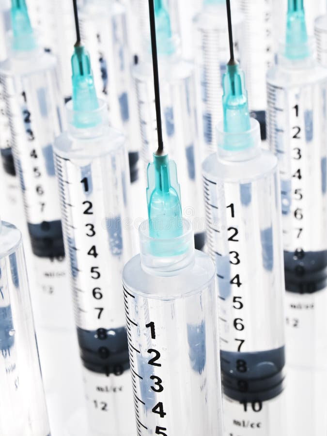 Multiple rows of syringes stock image. Image of biotechnology - 16972565