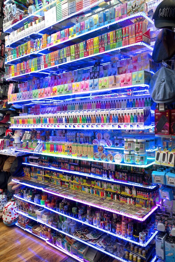 Multiple Rows of Vapes in Vivid Packaging. Soho, London. Editorial ...