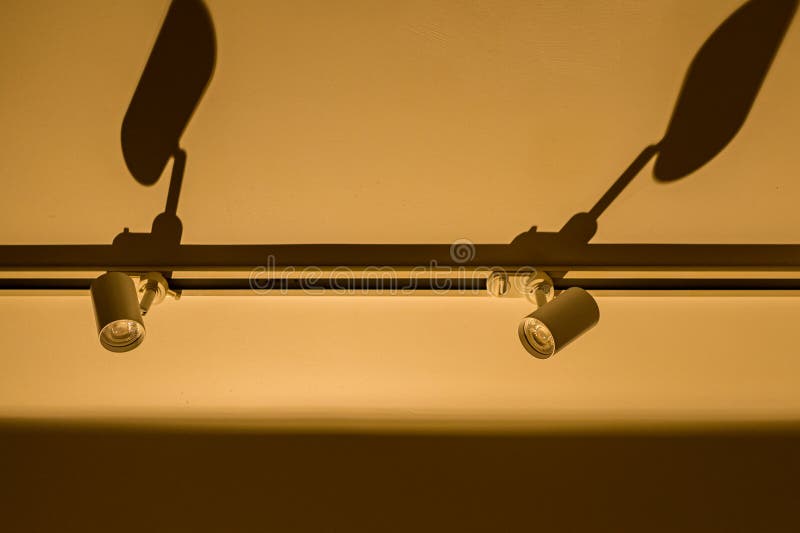 Multiple Spotlights Railing on Ceiling Wall. Stock Image - Image of ...