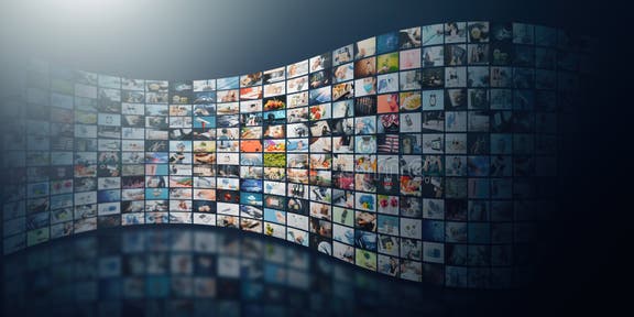 Multiple Television Screens with Remote Control Stock Photo - Image of ...