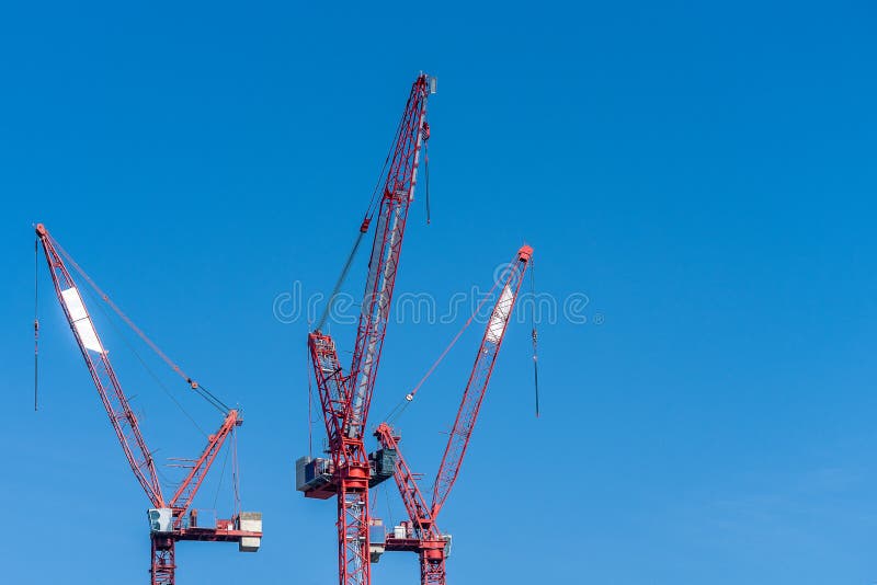 Multiple Tower Cranes Above a Concrete Structure Stock Image - Image of ...
