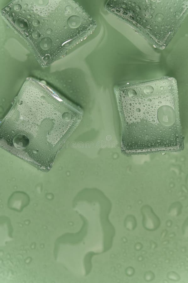 Ice Cubes from Above on a Green Background Stock Photo - Image of ...
