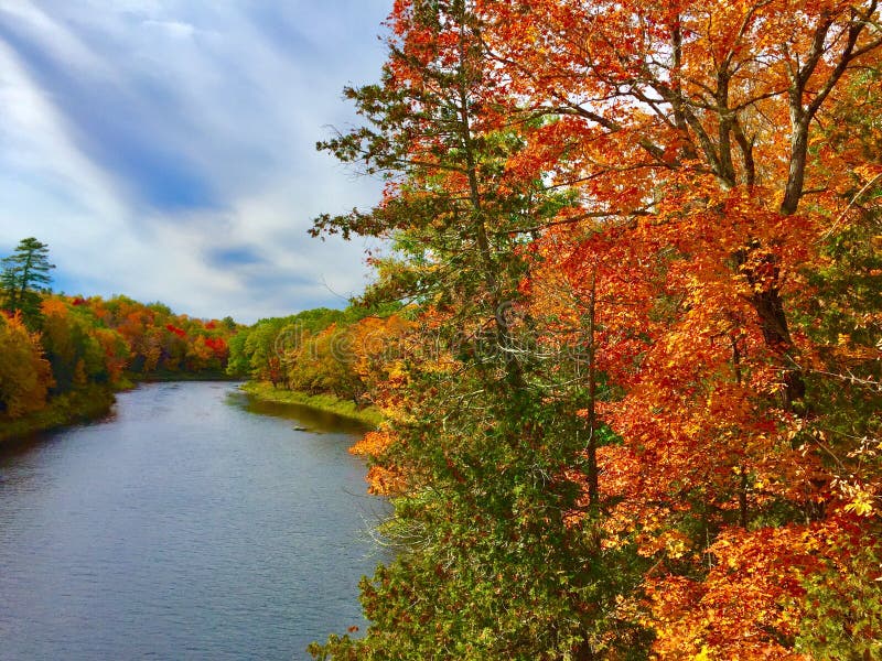 Multiple Trees with Fall Colors and River from Bridge Stock Photo ...