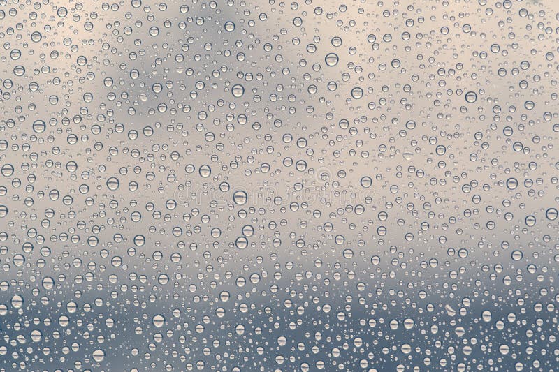 Multiple Water Drops or Raindrops of Different Sizes on a Window Glass ...