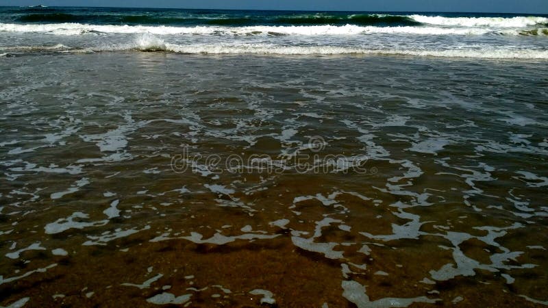 Multiple Waves Along the Shore Stock Image - Image of emerald ...