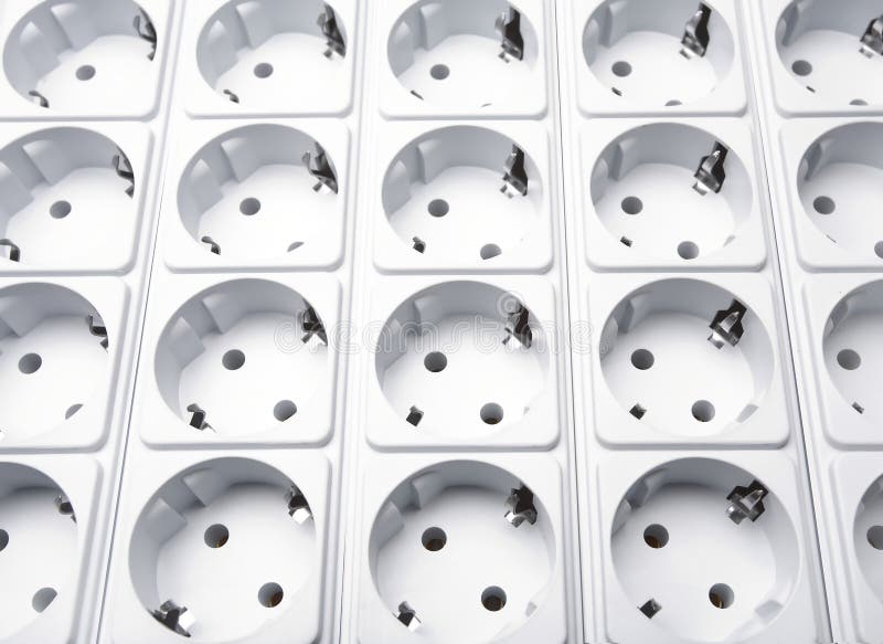 Multiple white outlet stock image. Image of wired, cable - 13338795