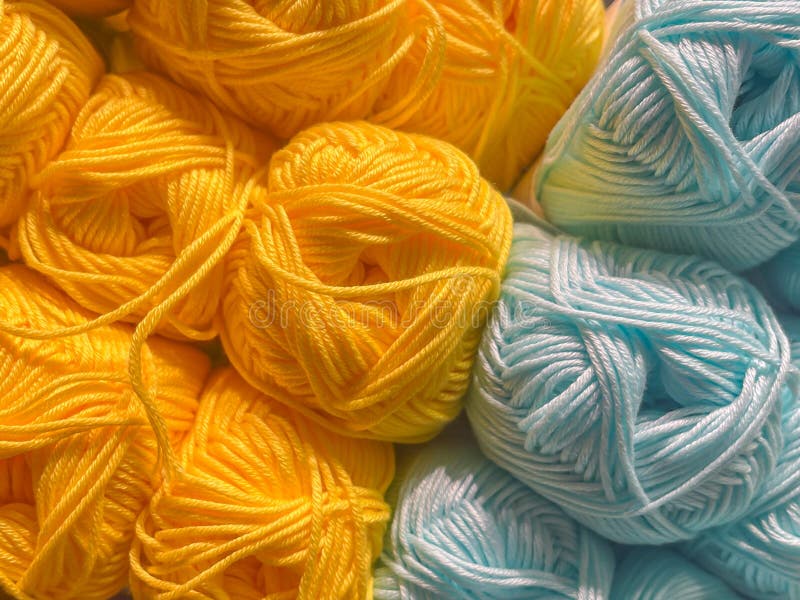 Multiple Wool Thread Balls in Yellow and Baby Blue on Display Stock ...