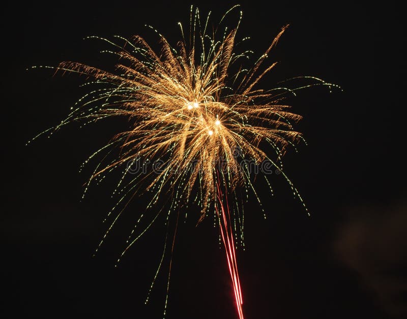 Multiple Yellow White and Red Fireworks at Night Stock Photo - Image of ...