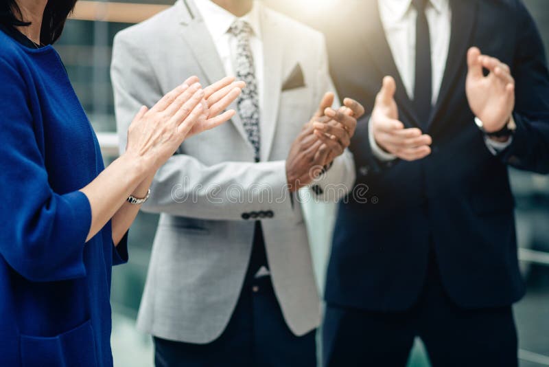 Multiracial Business Team Applauding Themselves for Great Work Done ... Multiracial Business Team Applauding Themselves for Great Work Done ...