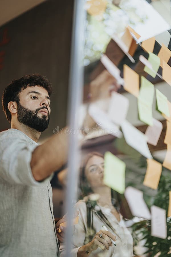 Multiracial Business Team Brainstorming and Planning in Modern Office ... Multiracial Business Team Brainstorming and Planning in Modern Office ...